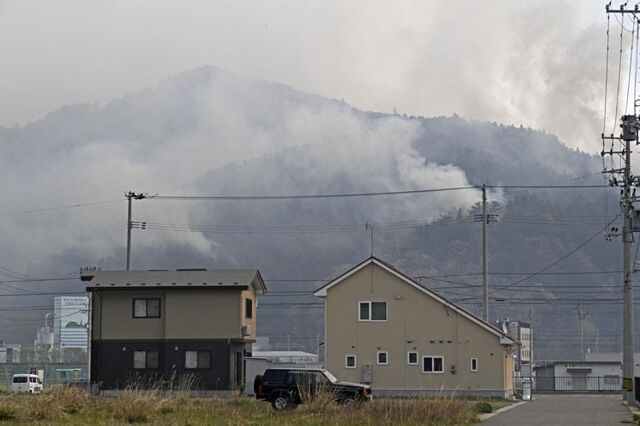 Northern Japan wildfires prompt mass evacuations as flames spread ...